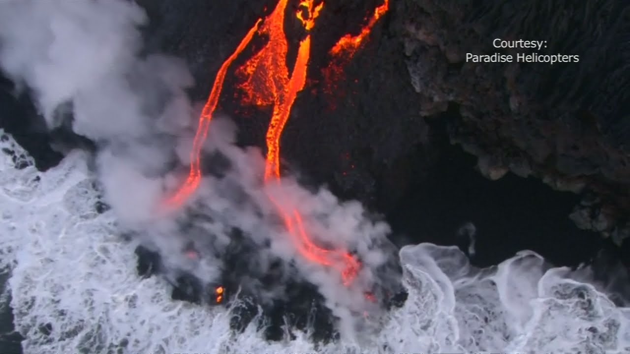 Lava spills from volcano into the sea - YouTube