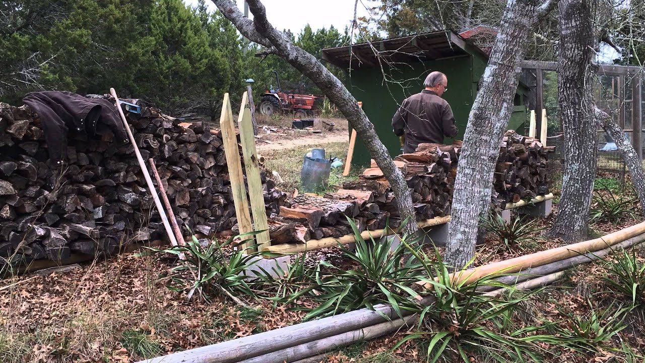 New firewood rack. cinder blocks and landscape timbers - YouTube
