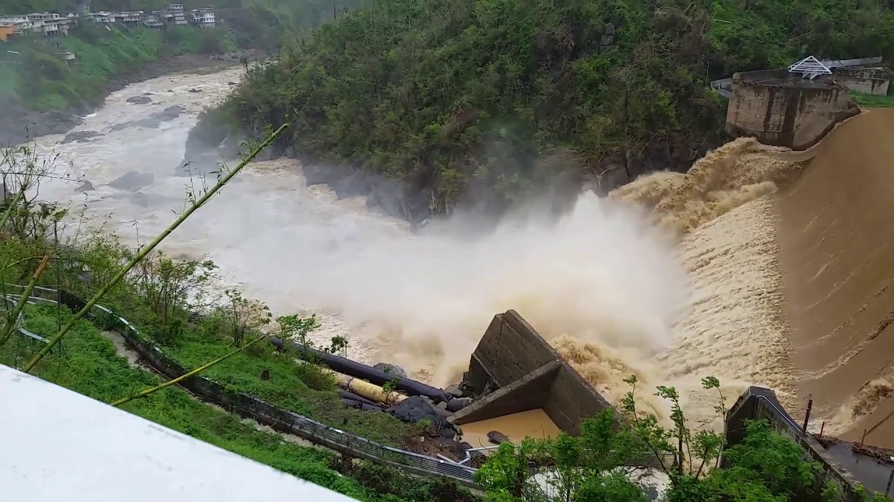 Comerio Dam in Puerto Rico Overflows After Torrential Rains - YouTube