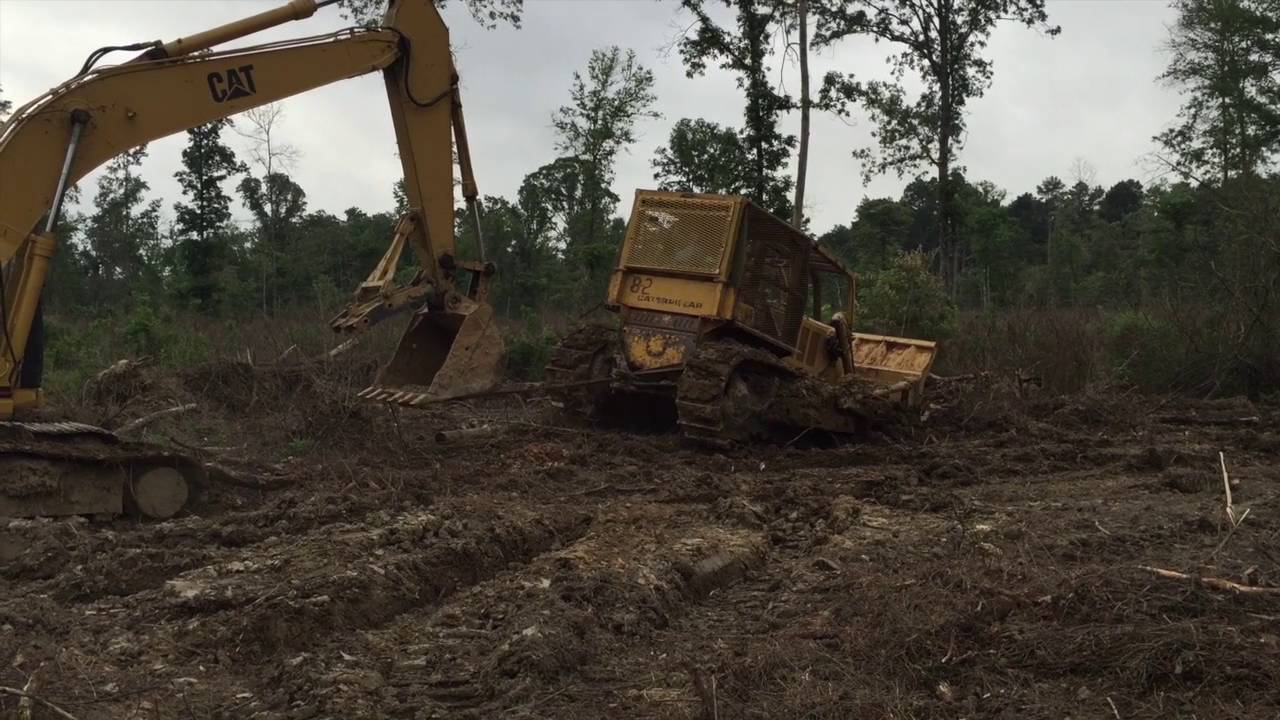 Trackhoe Pulling Out A D8 Dozer! - YouTube