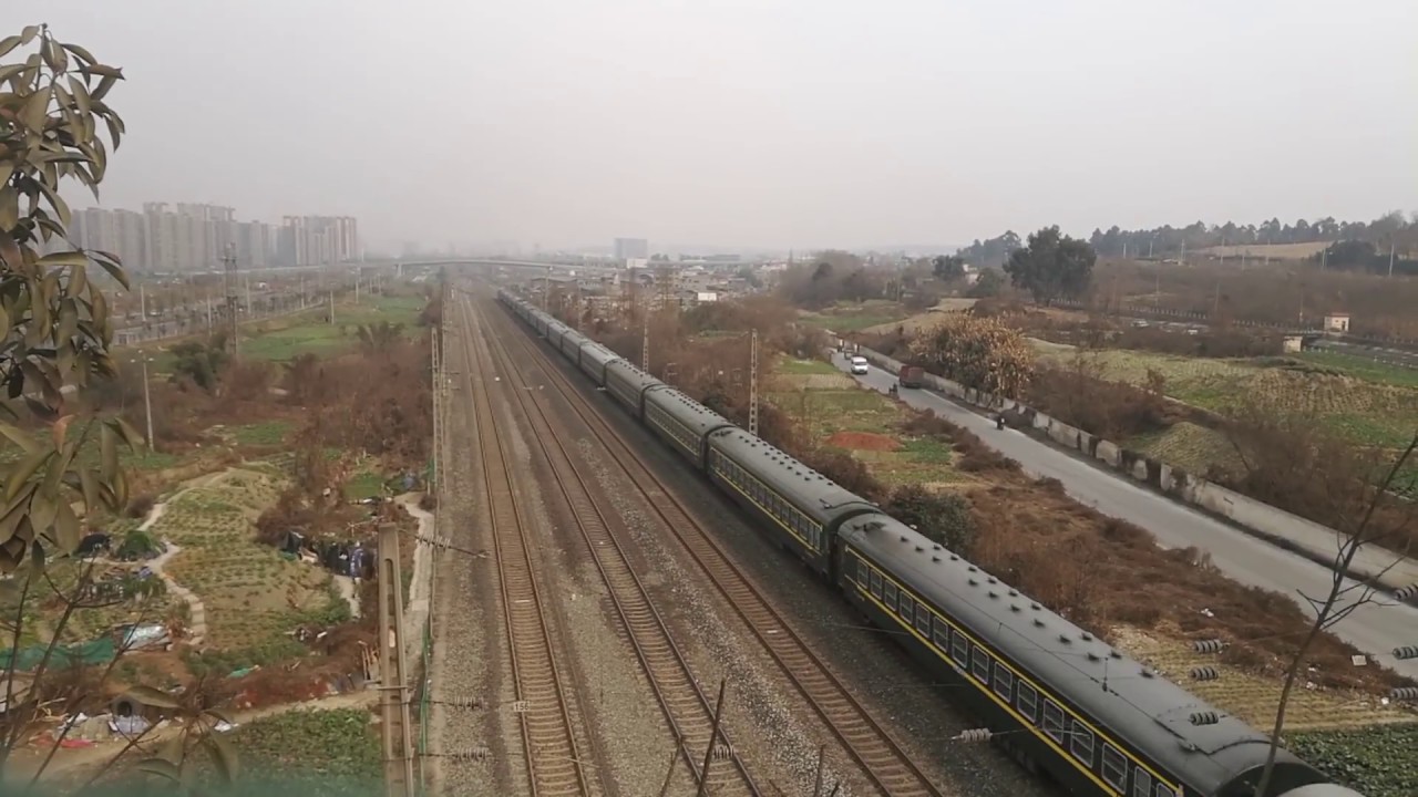 Passenger train Crossing Tianhuizhen station Powered By SS3 Electric ...