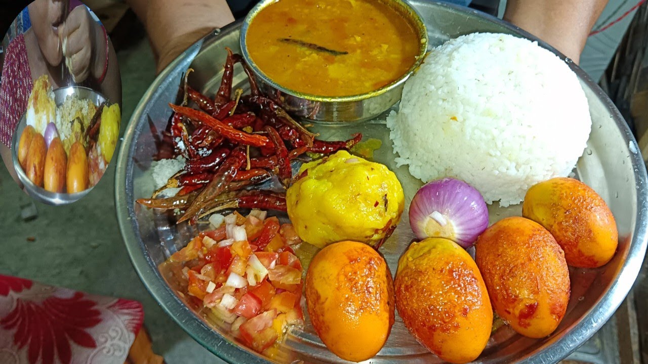 white-rice-4-eggs-paneer-aloo-curry-aloo-bharta-onion-tomato-salad