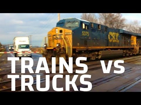 Freight Train Stops Trucks In Their Tracks + More - YouTube