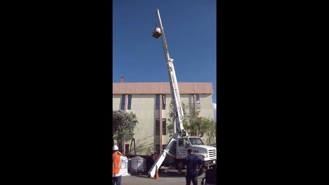 loading roof with materials - YouTube