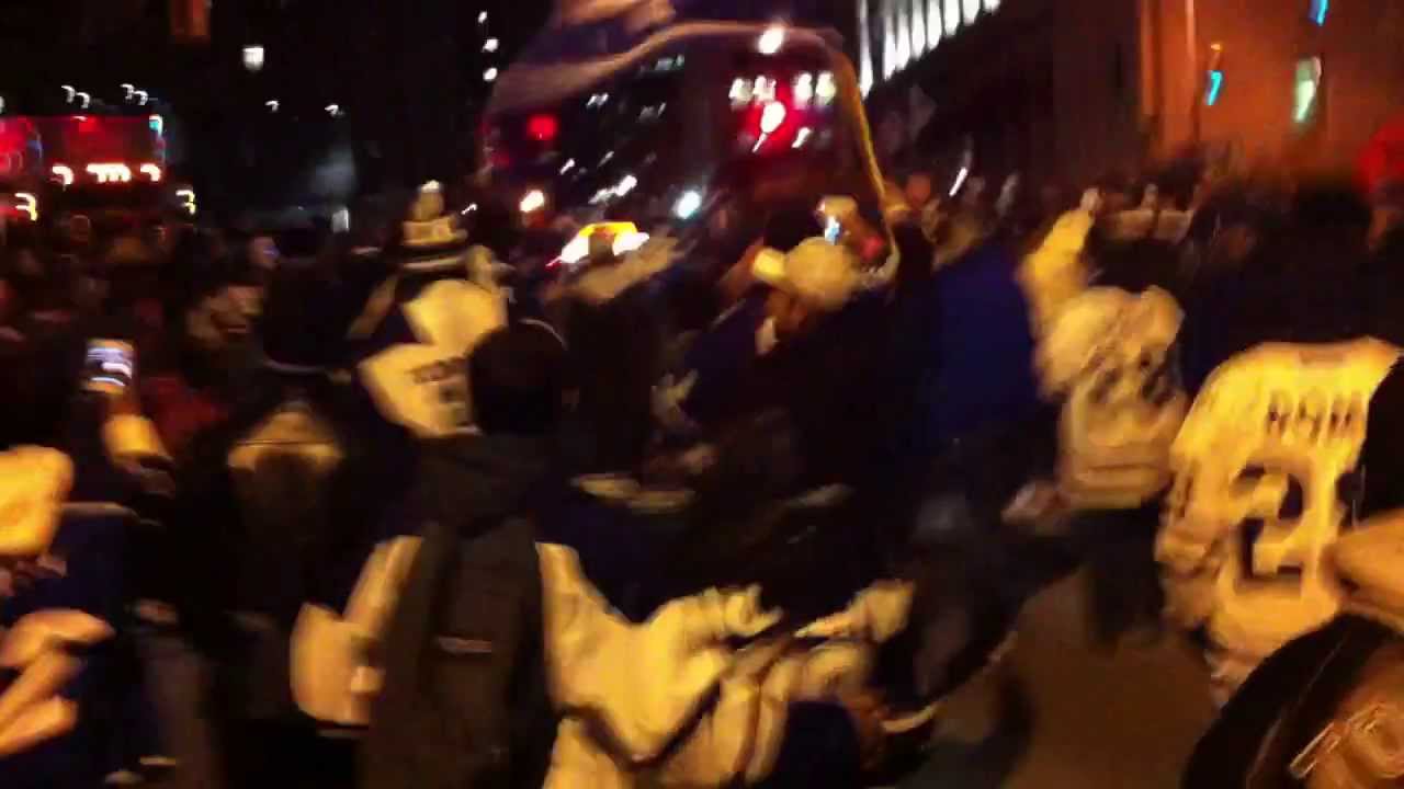 riot in toronto after leafs win - YouTube