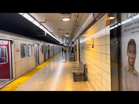 A Westbound Bombardier T1 Train on line 2 Arriving and Departing Main ...
