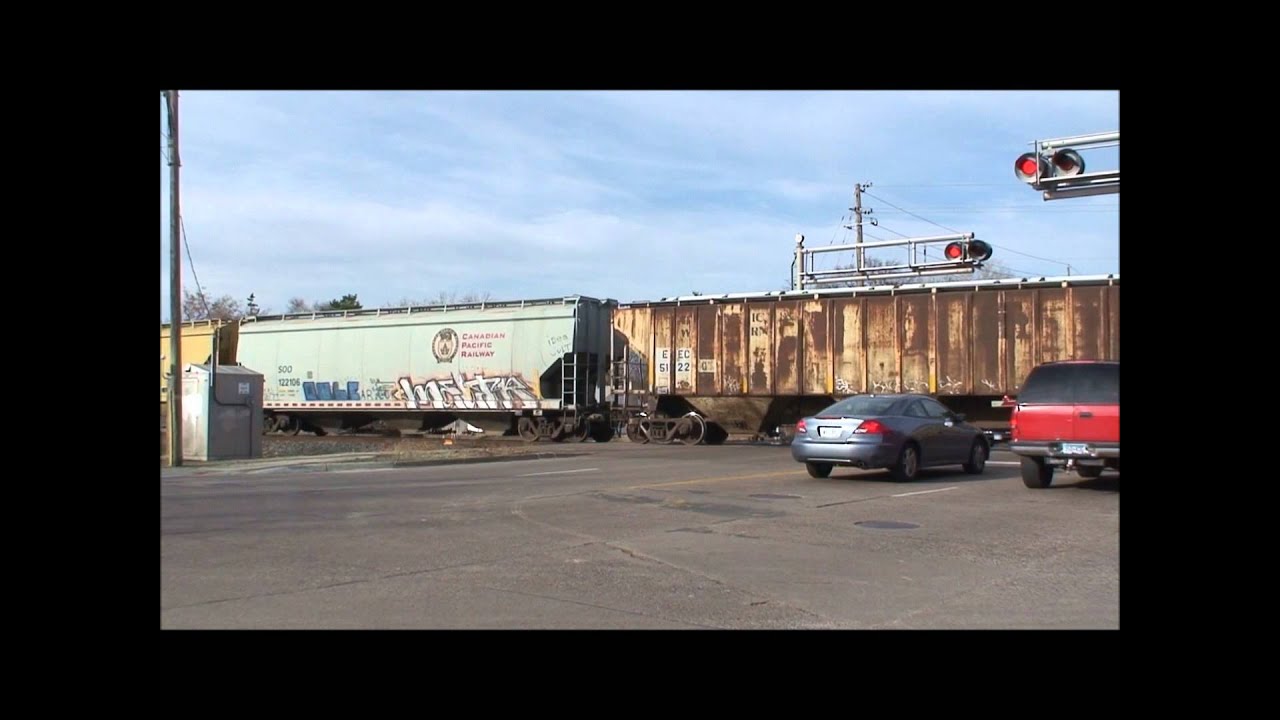 CP Freight Train With Loram Rail Equipment In Crystal, MN - YouTube