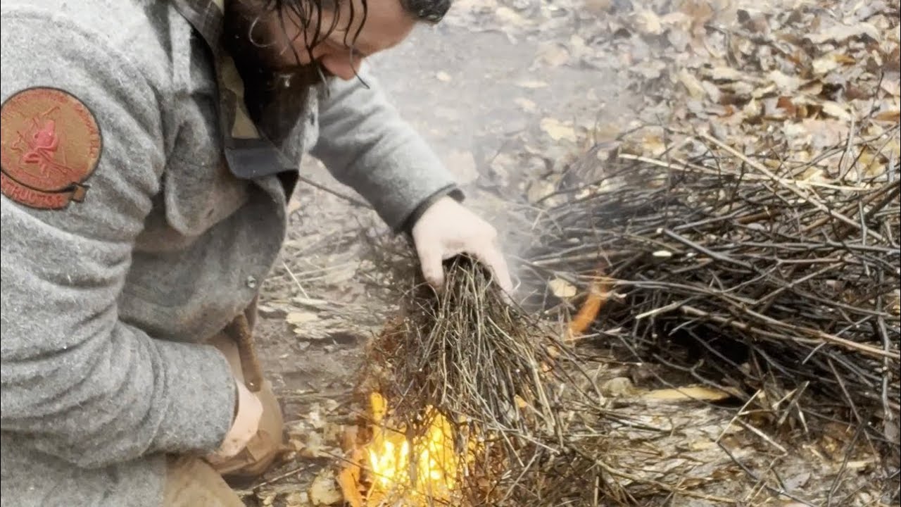 Practicing Firemaking in the rain - YouTube