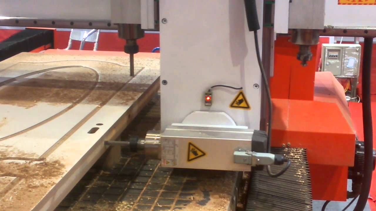 wooden door making cnc router machine with atc 3 heads - YouTube