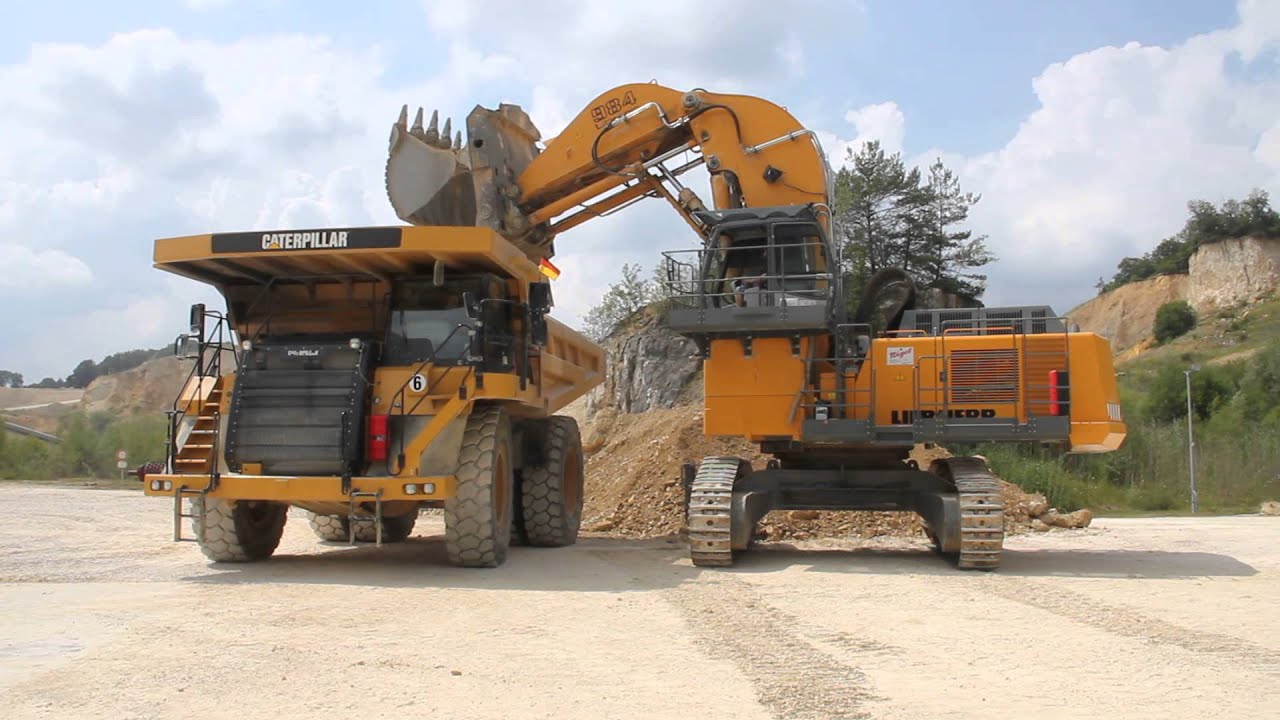 Liebherr R984C-HD loading CAT 777F - YouTube