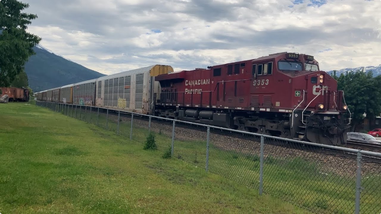 Canadian Pacific 9353 leads an autorack and freight train at Revelstoke ...