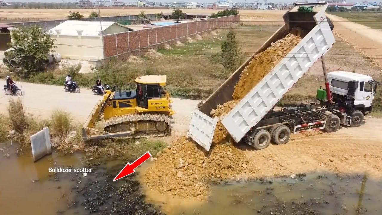 Starting PROJECT Heavy Dump trucks dumping Stone delete water pushing ...