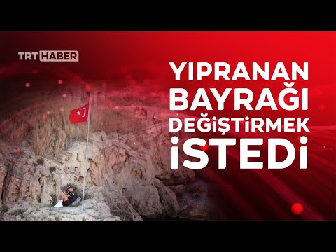 Bayrak sevgisiyle çıktığı kayalıklarda mahsur kaldı