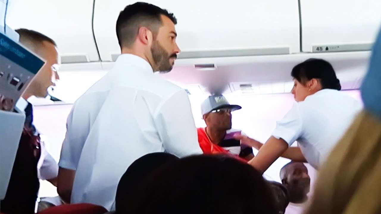 PLANE FIGHT, EMERGENCY LANDING AND MAN ARRESTED - Additional Footage ...