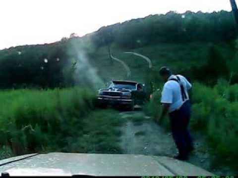 Pulling out a Redneck four wheeling in a 2 wheel drive FORD - YouTube