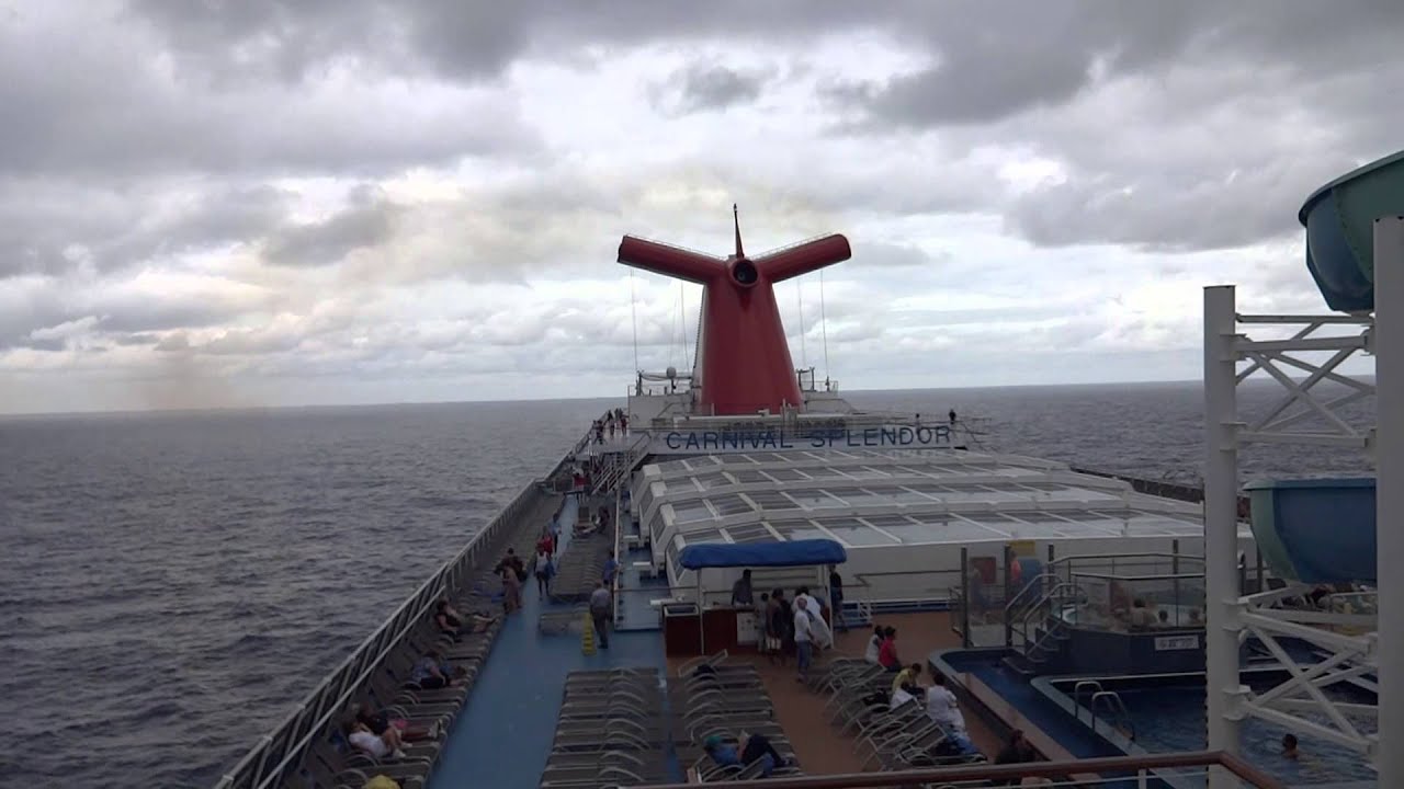Carnival Splendor approaching rain storm at sea - YouTube