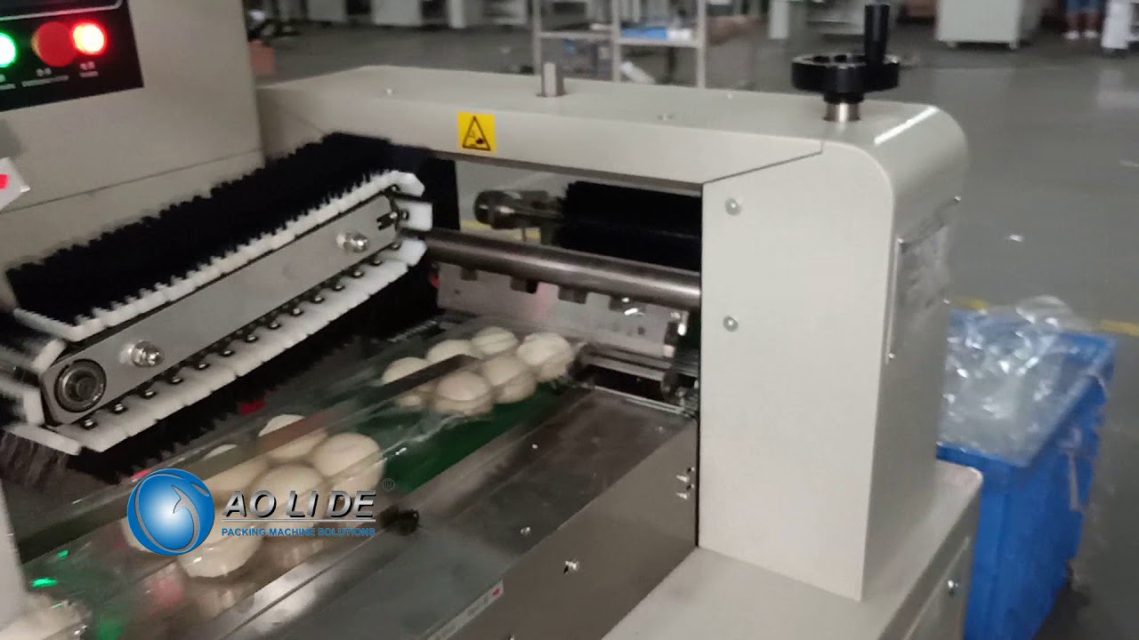 Tray food bread flow wrapping machine - YouTube