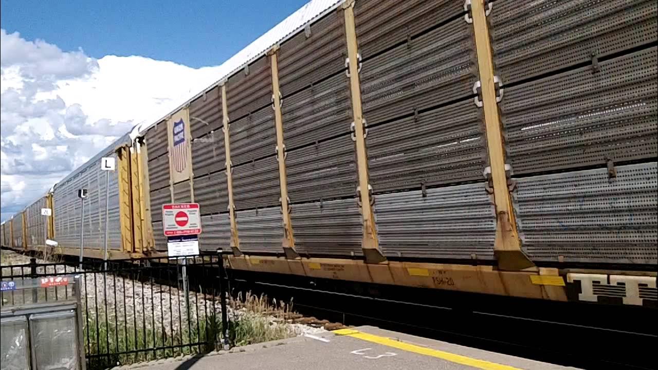 CP 147 w/ CP 5698 & NS 8859 hooked E.S. lead this long WB Autorack ...