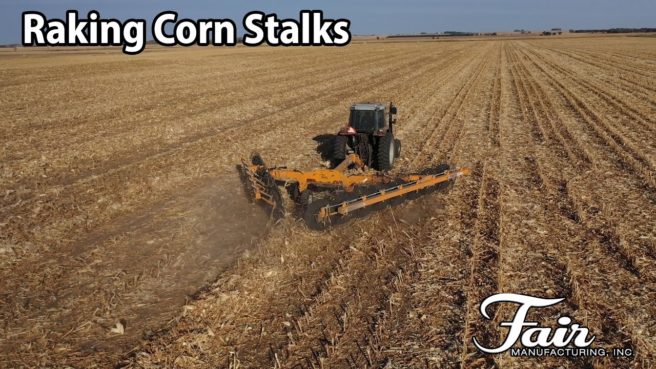 Raking Corn Stalks with Fair Manufacturing 1500 Hay Rake - YouTube