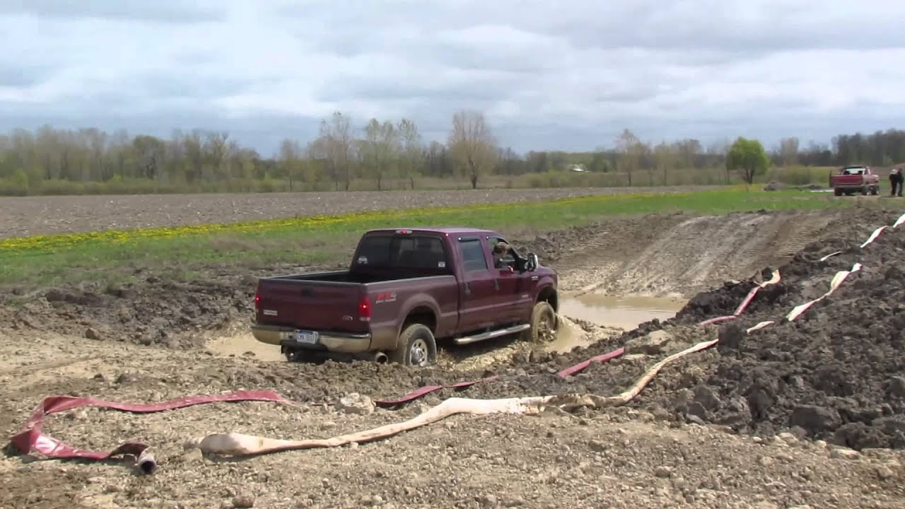 Ford F250 Having Fun At Back 40 Mud Bog - YouTube
