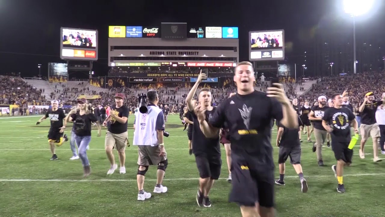 Arizona State Students Rush Field After UW Win - YouTube