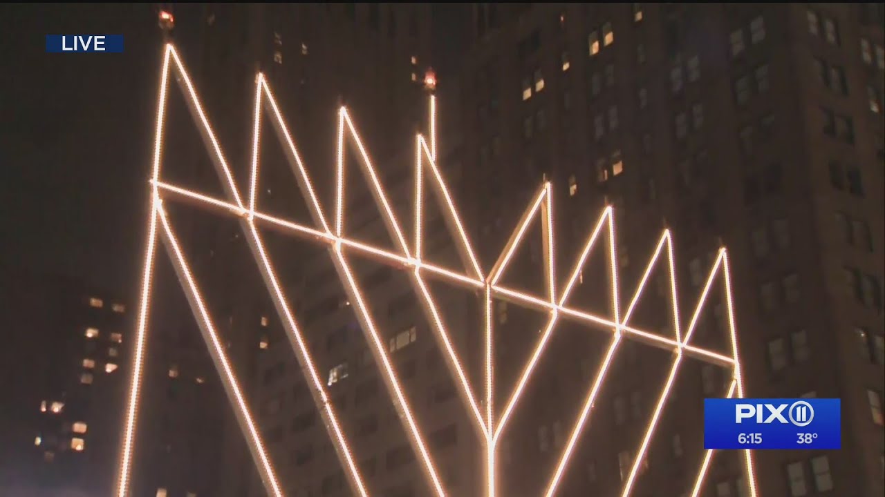 Community gathers to light world's biggest menorah on first night of ...