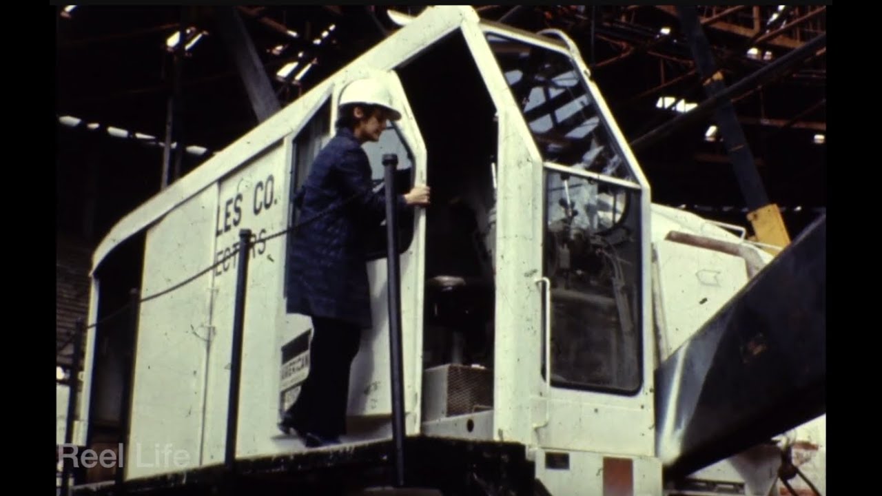 1973 Mystery reel! Female heavy crane operator, unknown stadium construction, USA - YouTube
