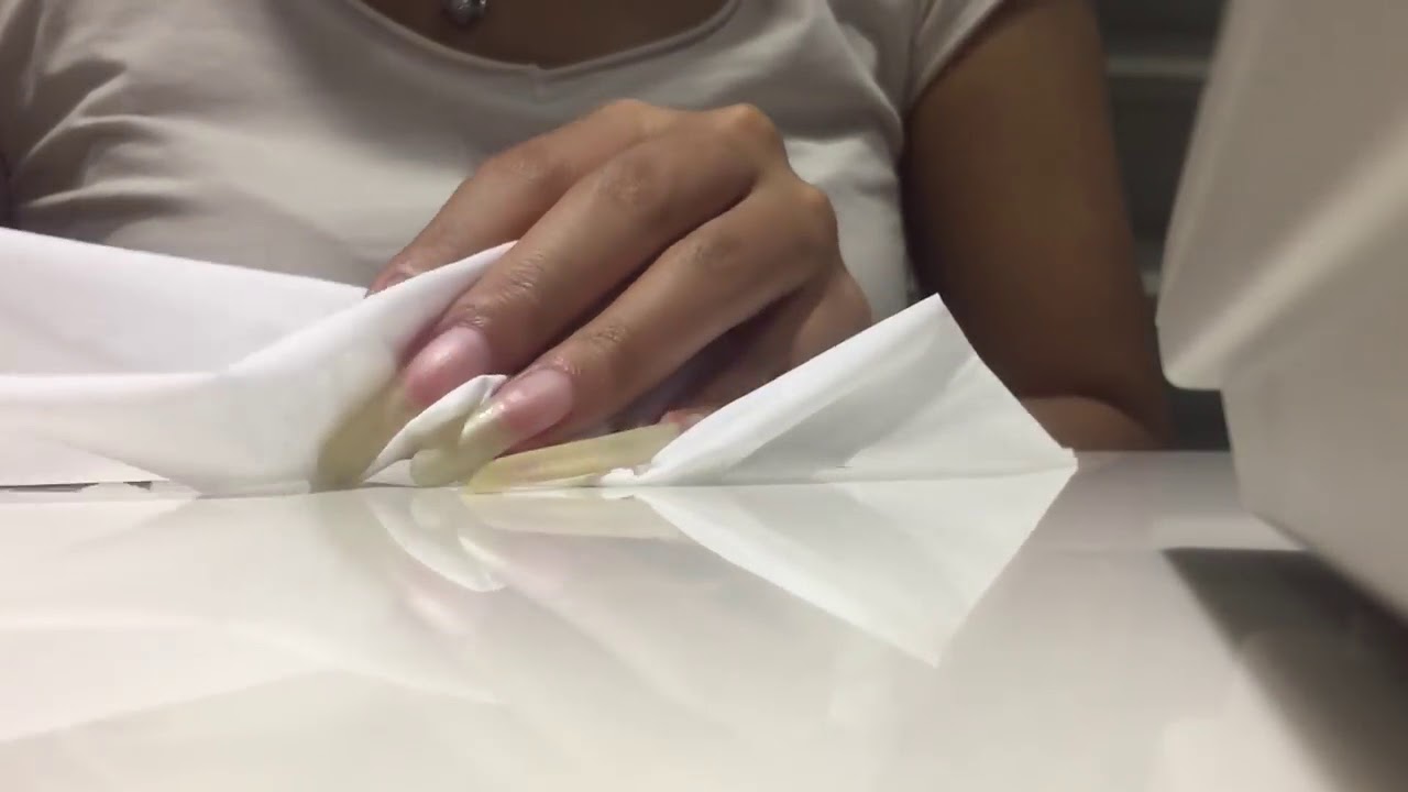 Tang Tang playing with paper using her bare long nails (video 17) - YouTube