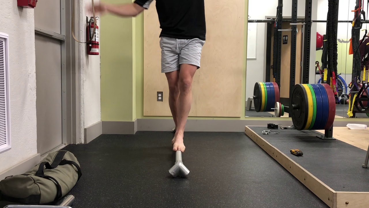 Tandem stance floor touches - YouTube