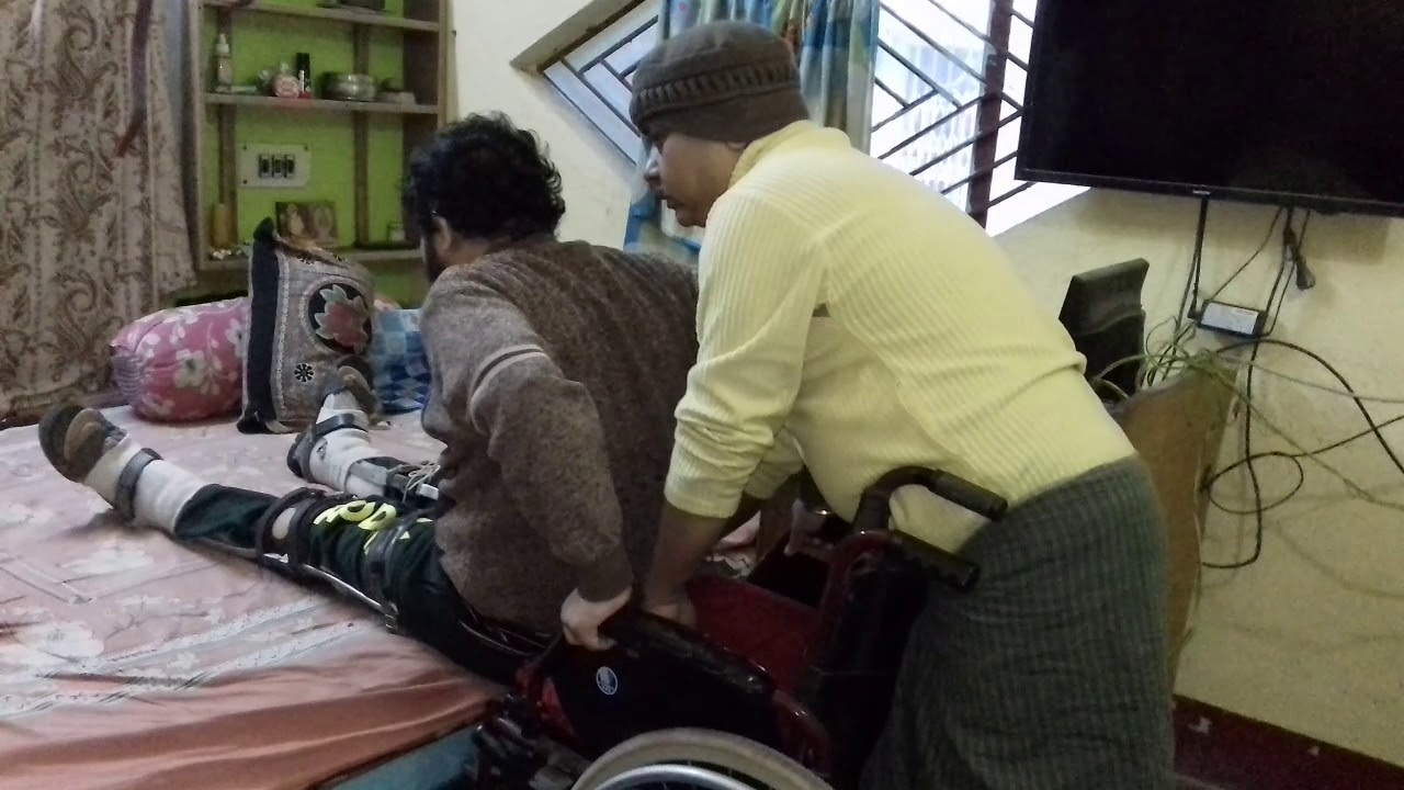 A Man With T6 Level Spinal Cord Injury Is Getting Ready For Exercise ...