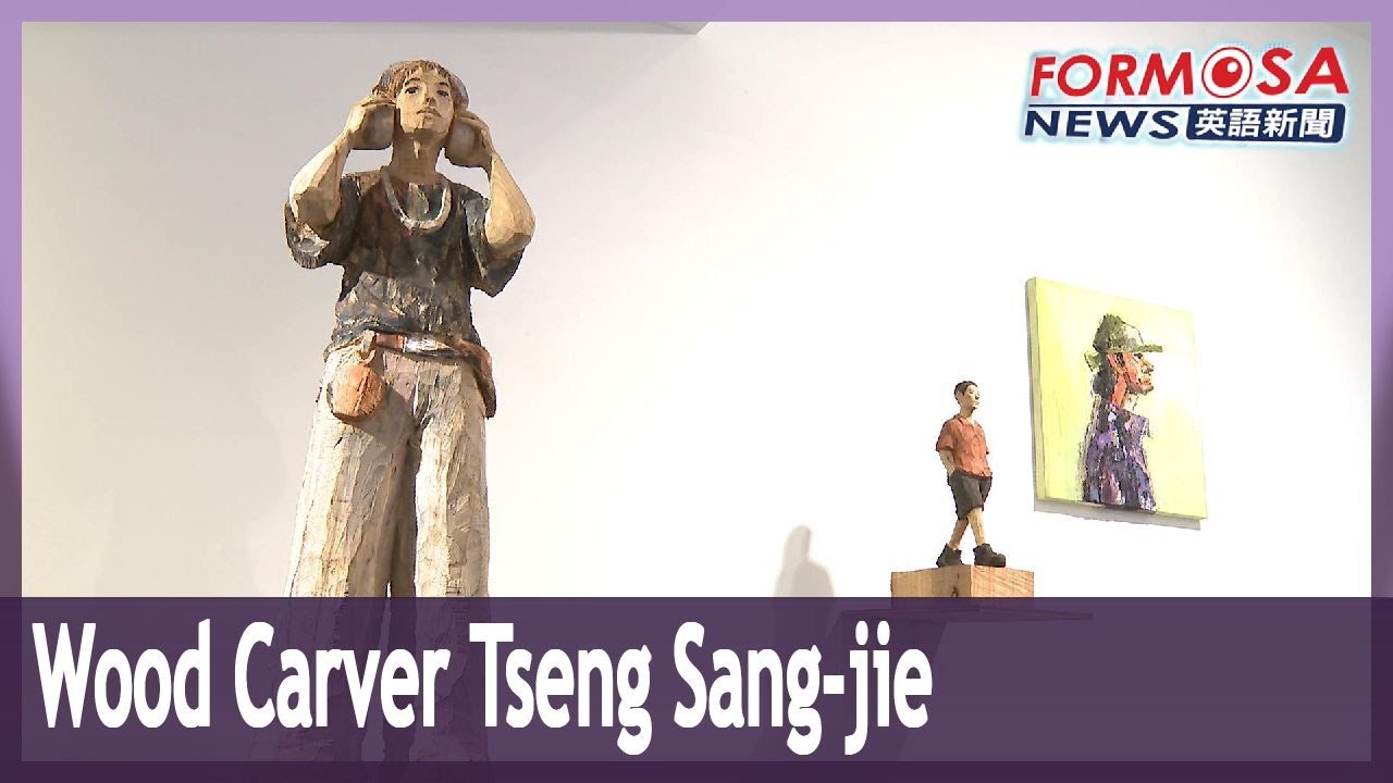 Wood carver Tseng Shang-jie creates figurines of people seen in ...