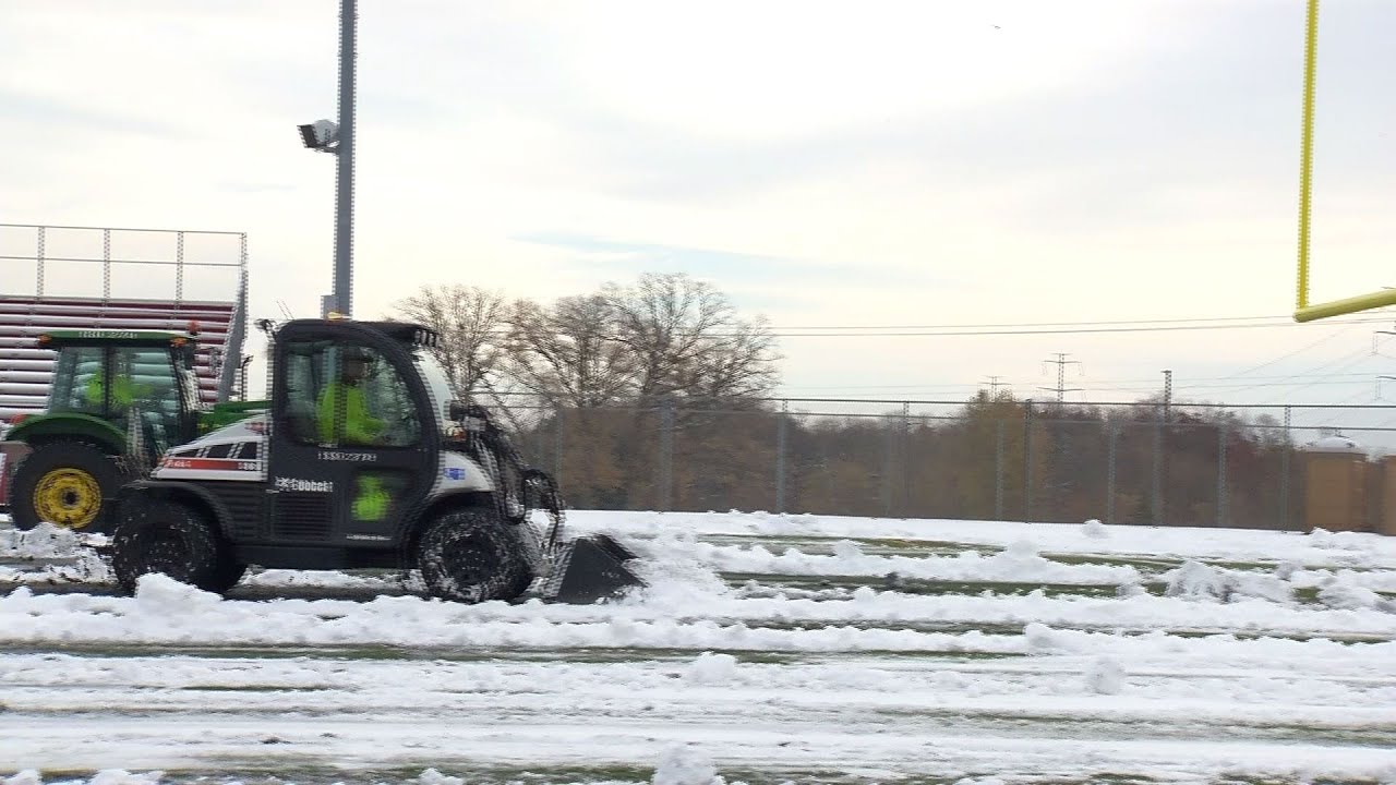 Something You Don’t See Often: Crews Remove Snow off Maple Grove Turf ...