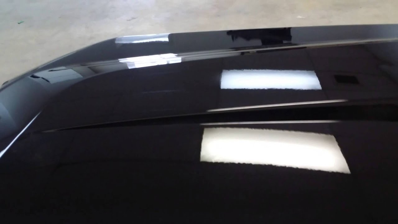 Hail damaged hood before repairs - YouTube
