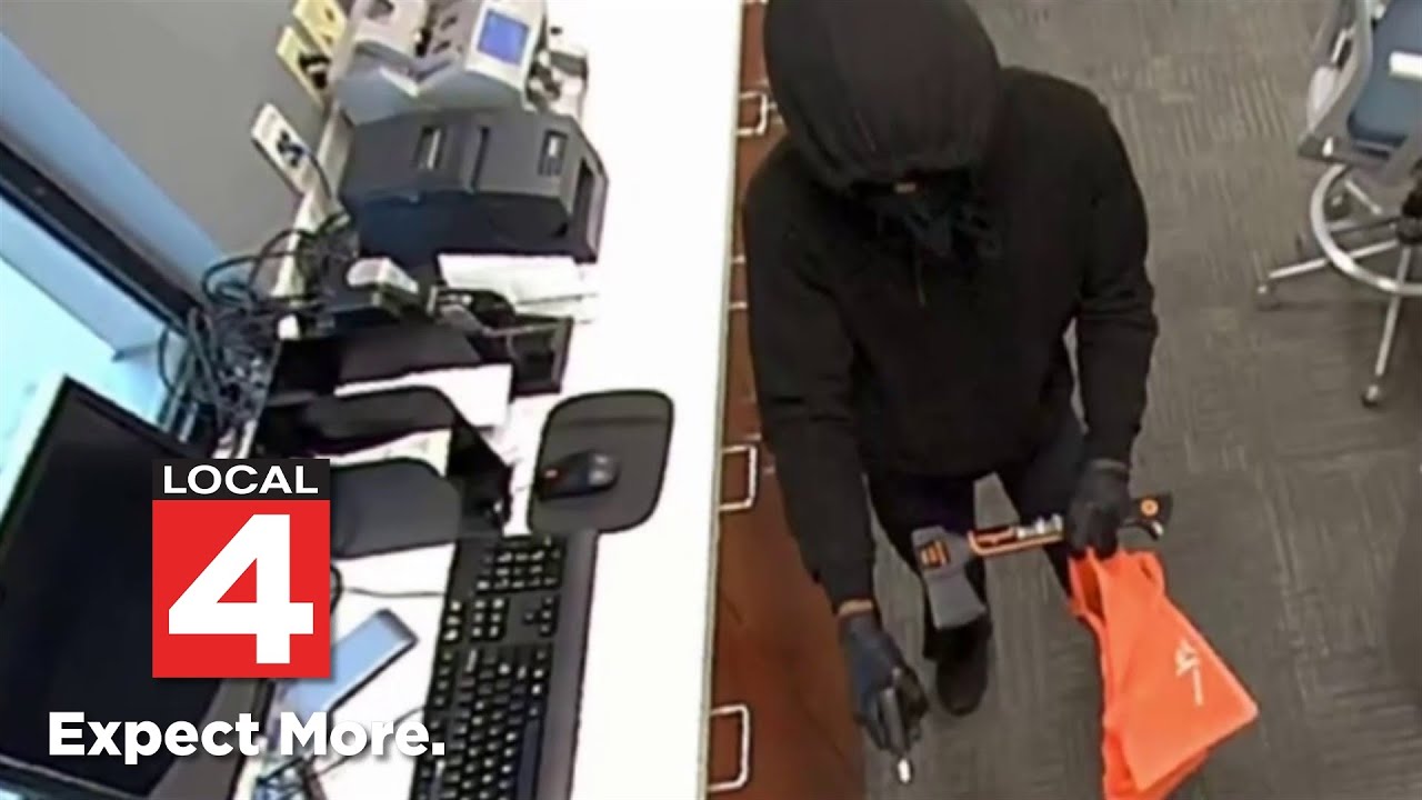 Woman charged with bank robbery, hatchet attack on employee in ...