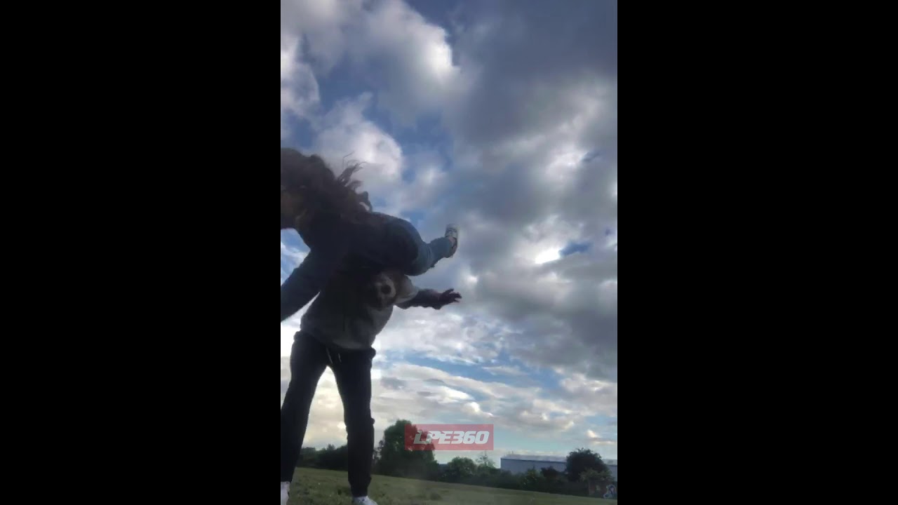 Girl sitting on shoulders falls off - YouTube