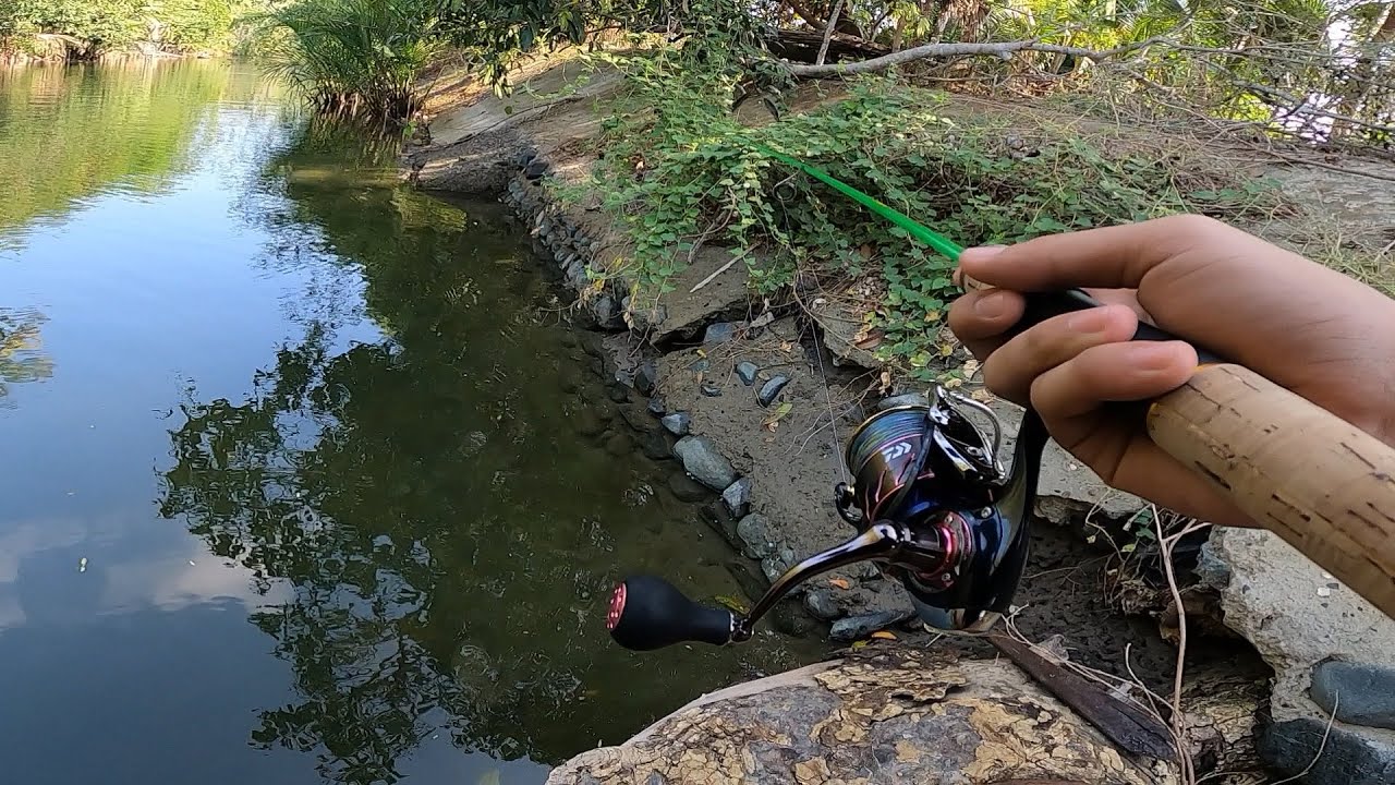 Fishing under an old bridge in Philippine Countryside - YouTube