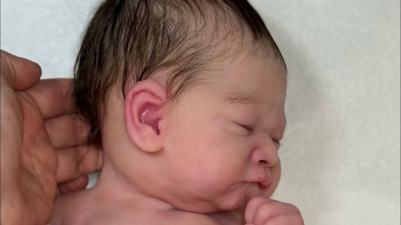 Full body silicone baby doll movement - YouTube