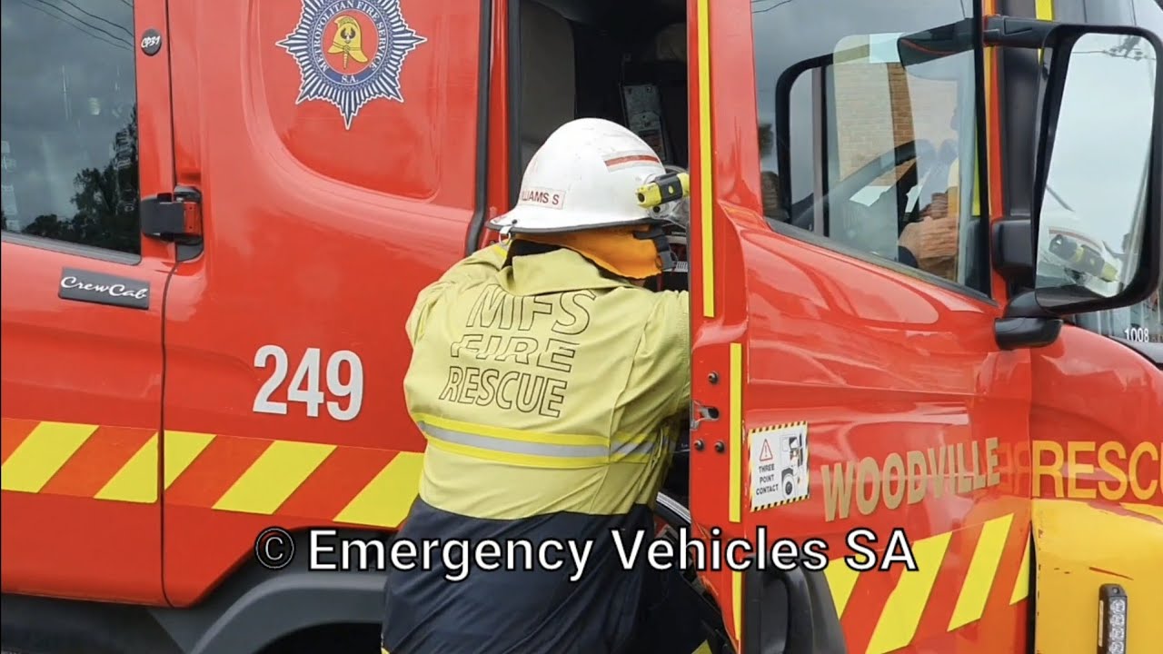 SA Metropolitan Fire Service firefighters assessing rolled Isuzu truck ...