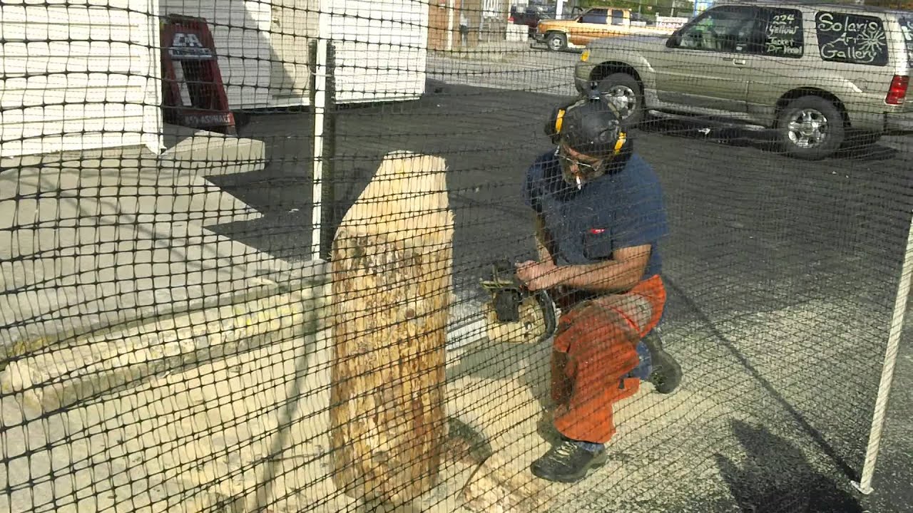 Harley Dougherty Chainsaw artist at Solaris Gallery - YouTube