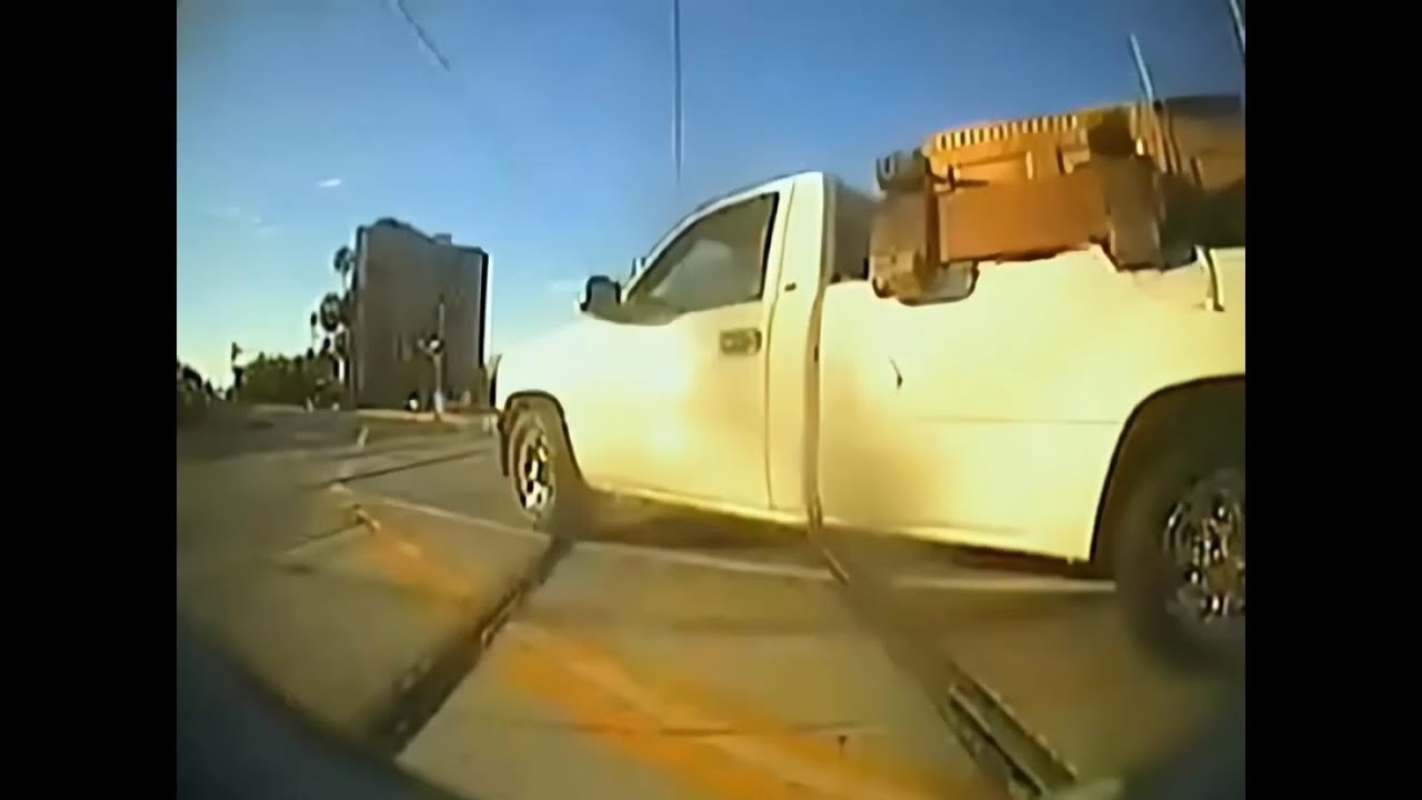 Light Rail Train Hits Pickup Truck - YouTube