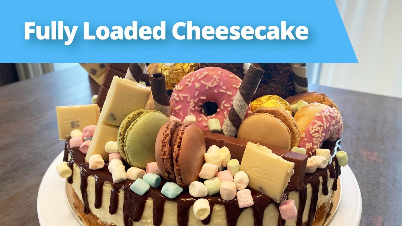 How to decorate an over the top, fully loaded cheesecake - YouTube