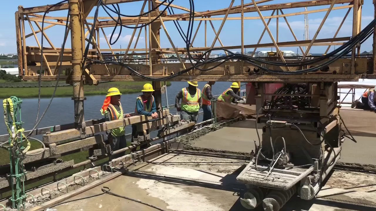 Work continues on the Surf City high-rise bridge - YouTube
