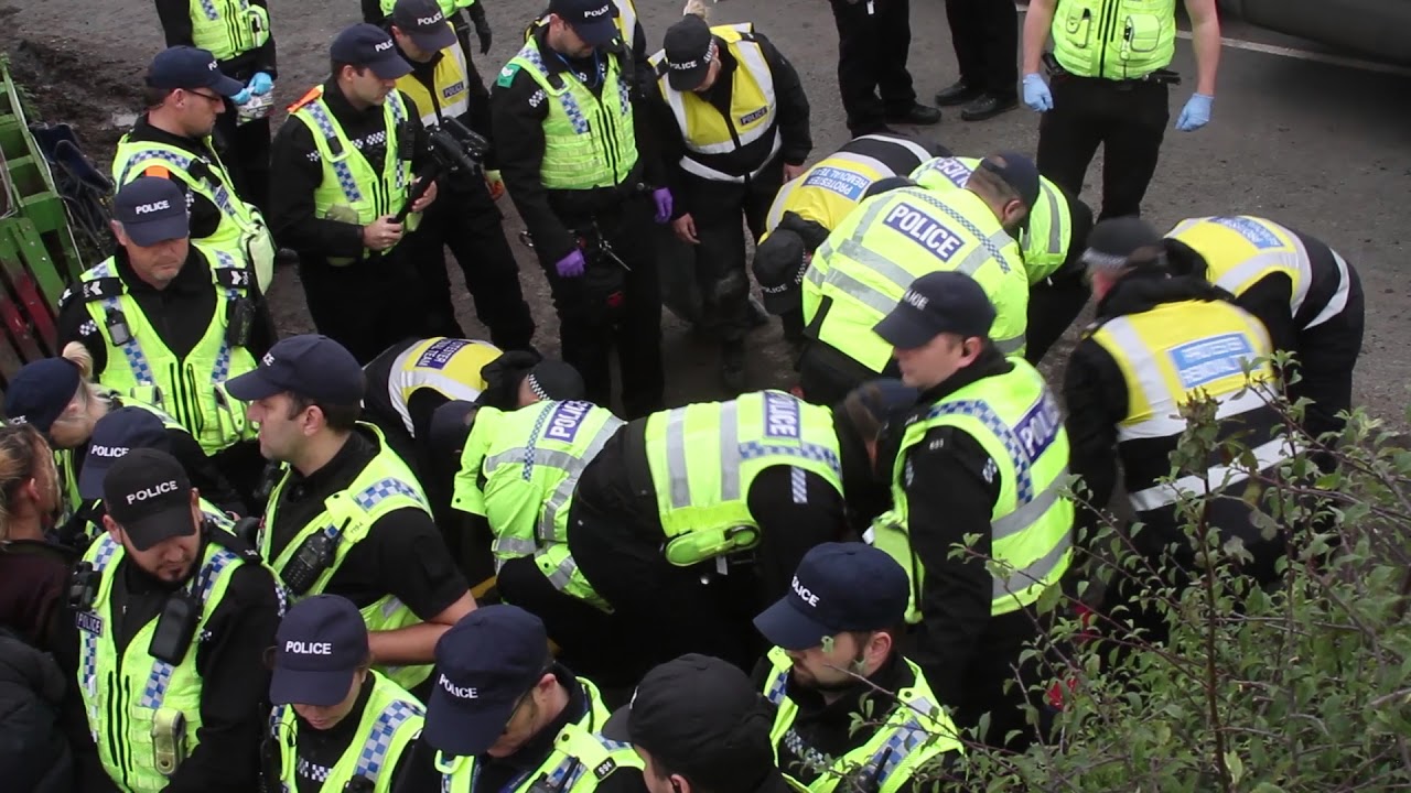 Police lift Protectors attached to lock on device at anti-fracking ...
