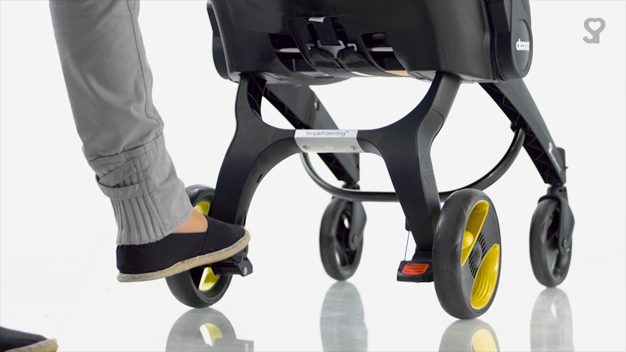 Doona Car Seat (How To Use) - Using the Brakes - YouTube