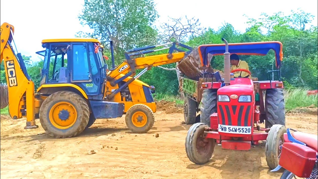 New Jcb 3dx Backhoe Loader Machine Loading Red Mud In Mahindra 475 DI ...