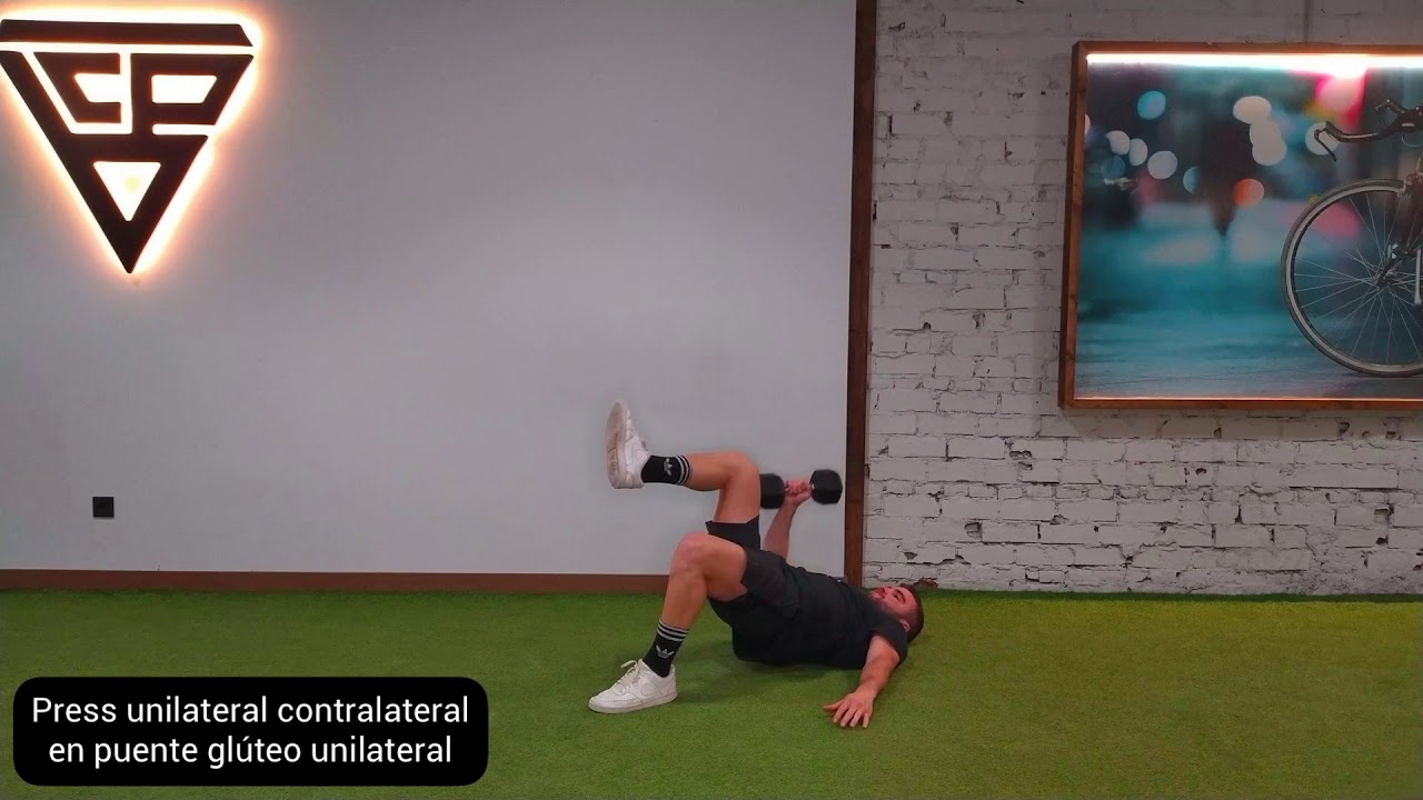 Press unilateral contralateral con puente de glúteo unilateral - YouTube