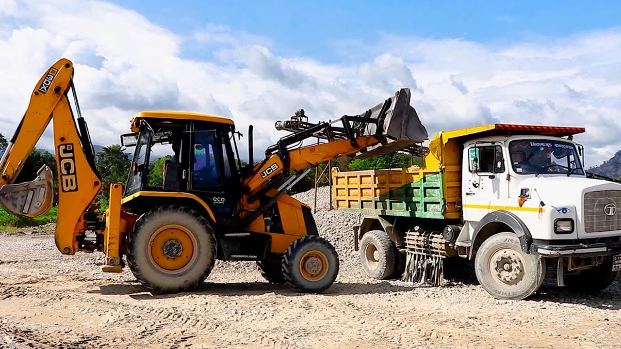 JCB 3dx roada ballast loading on truck.... - YouTube