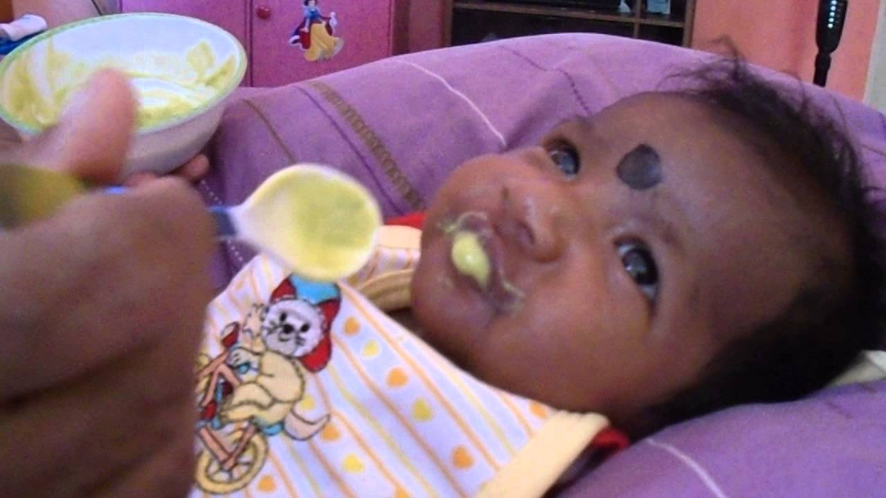 Baby Desandu eating avocado first time - YouTube