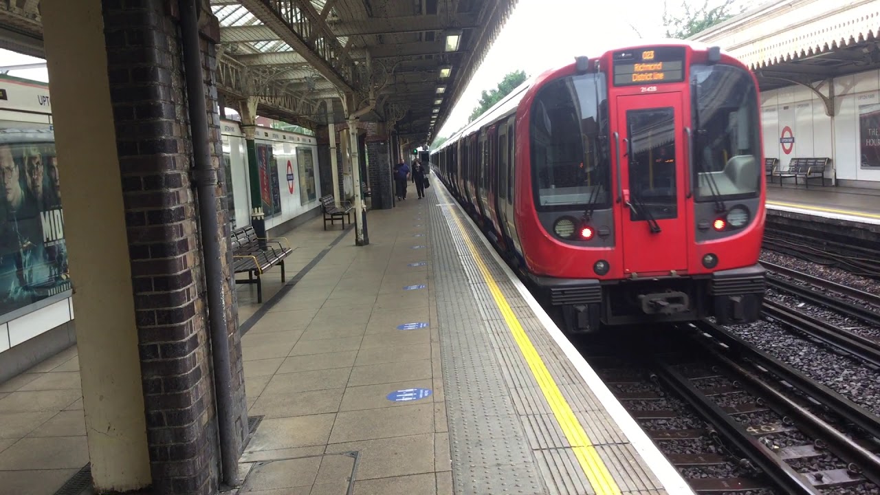 2 district line trains arriving and departing at Upton Park - YouTube