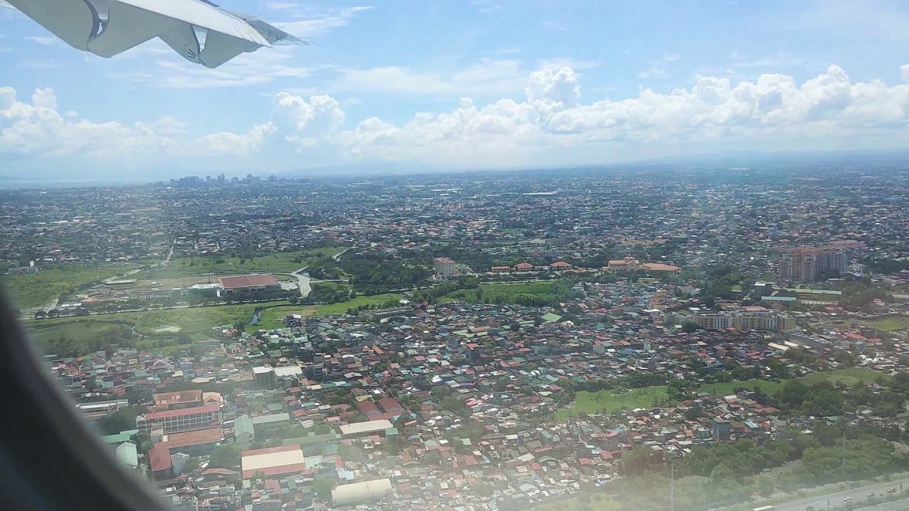 Airplane landing window view (Manila, Philippines) - YouTube